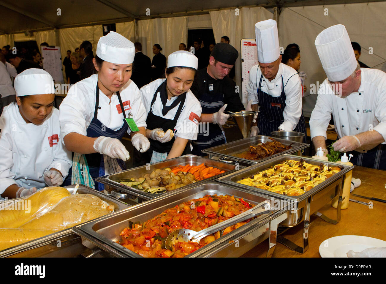 Chefs preparing plates of food Stock Photo - Alamy