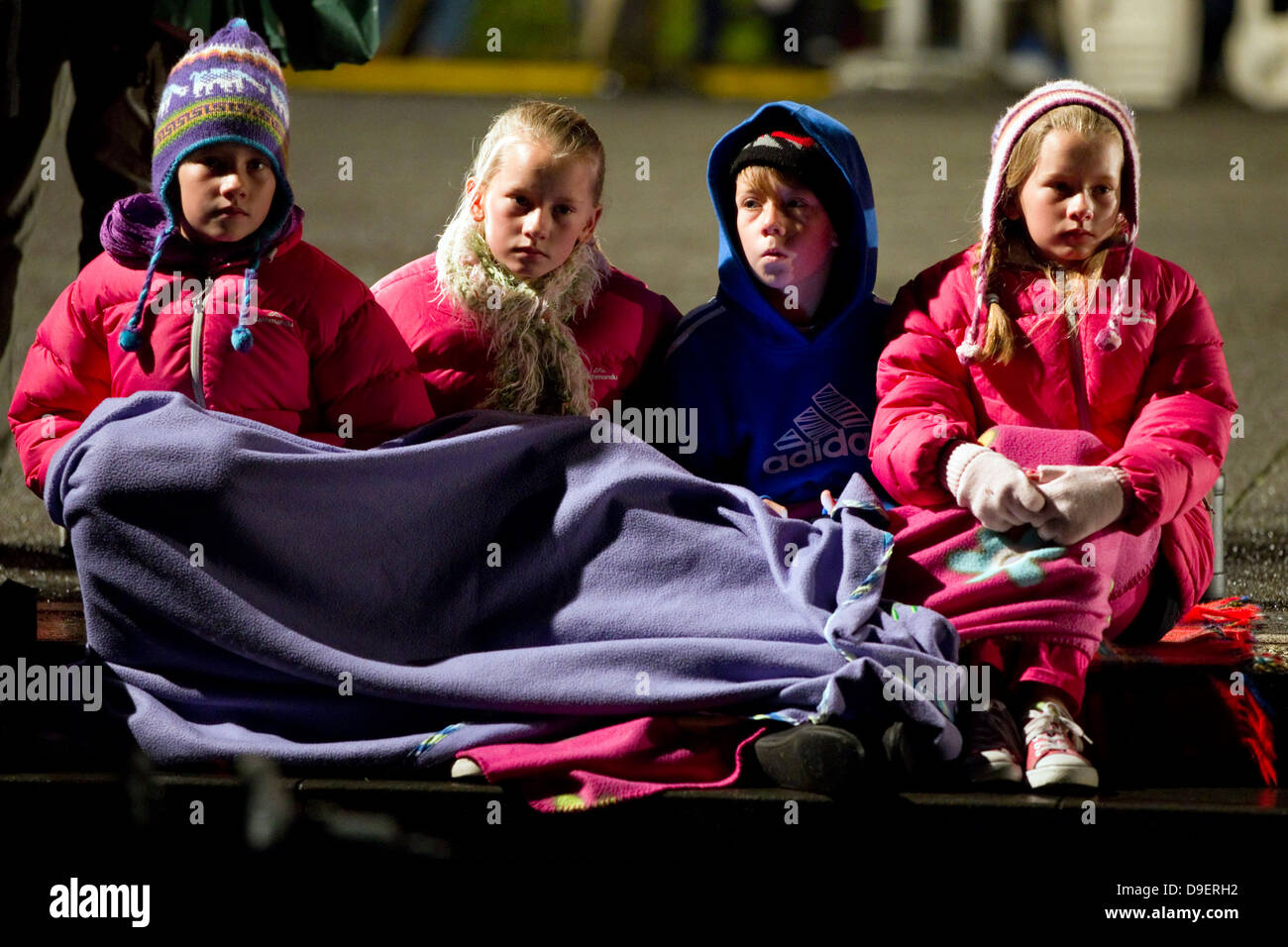 Four children watch the Anzac Day Dawn Service, War Memorial Museum ...