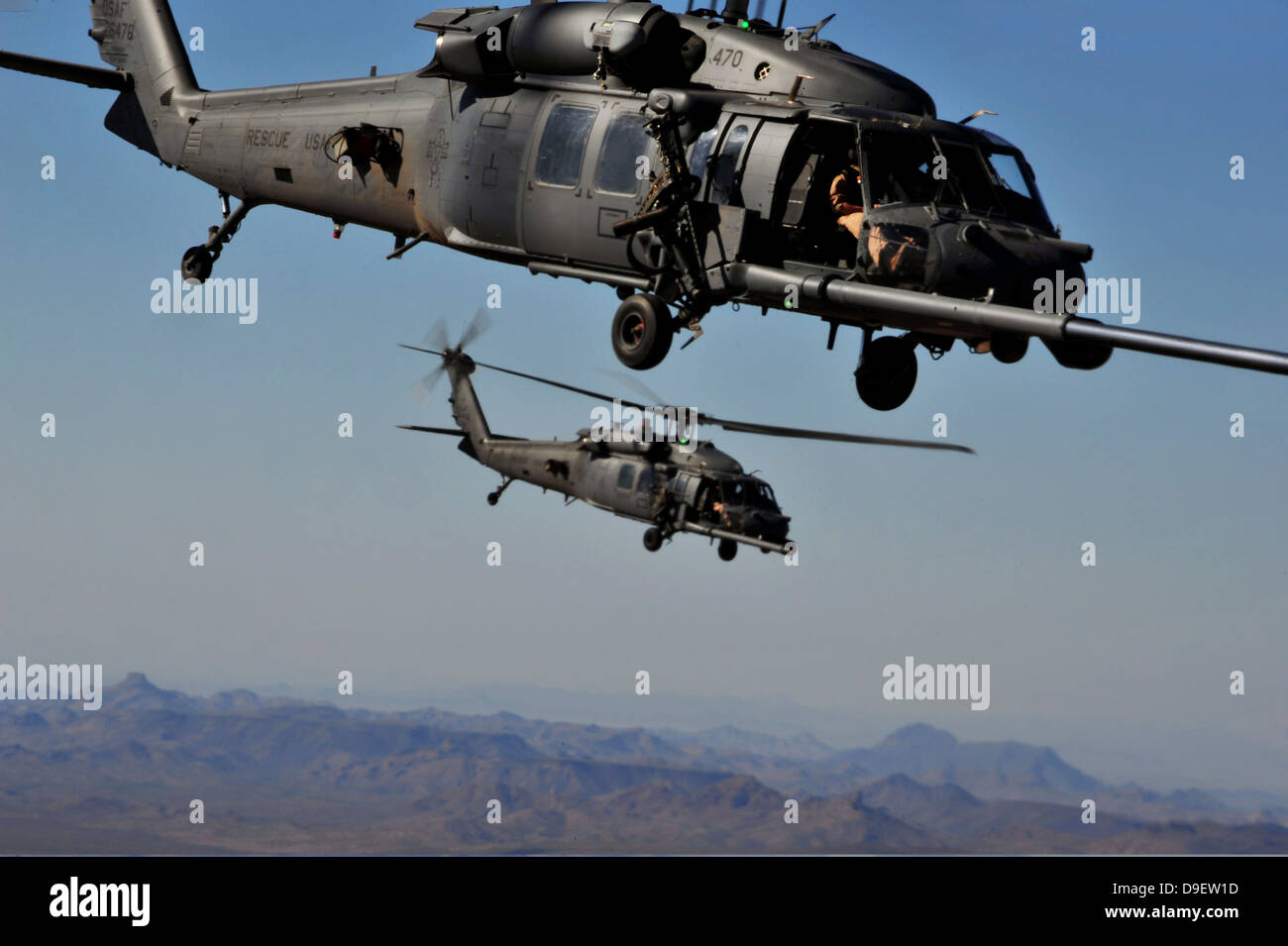 Two HH-60 Pave Hawk helicopters prepare for aerial refueling Stock ...