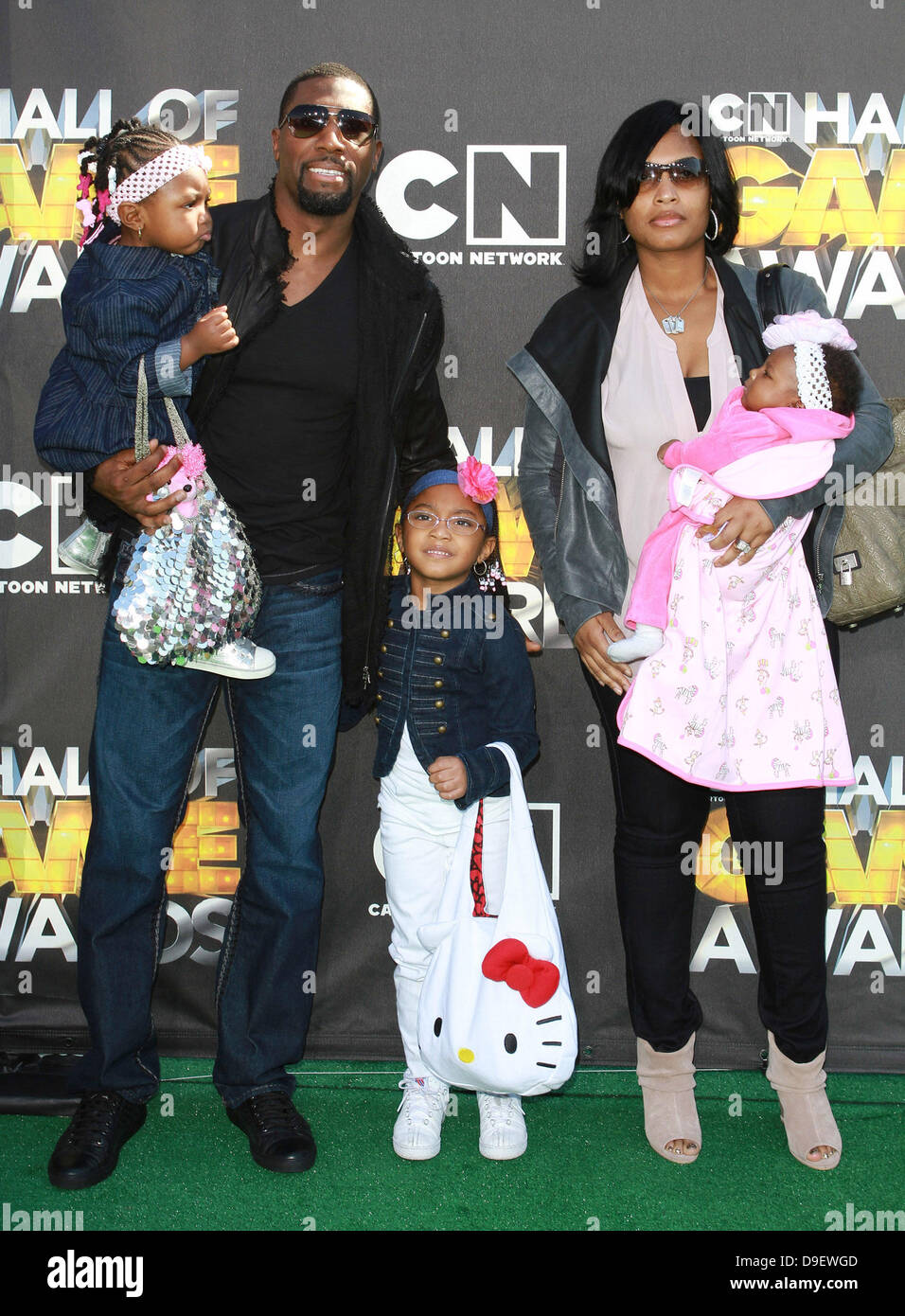 Greg Jennings of the Green Bay Packers and family Cartoon Network 'Hall ...