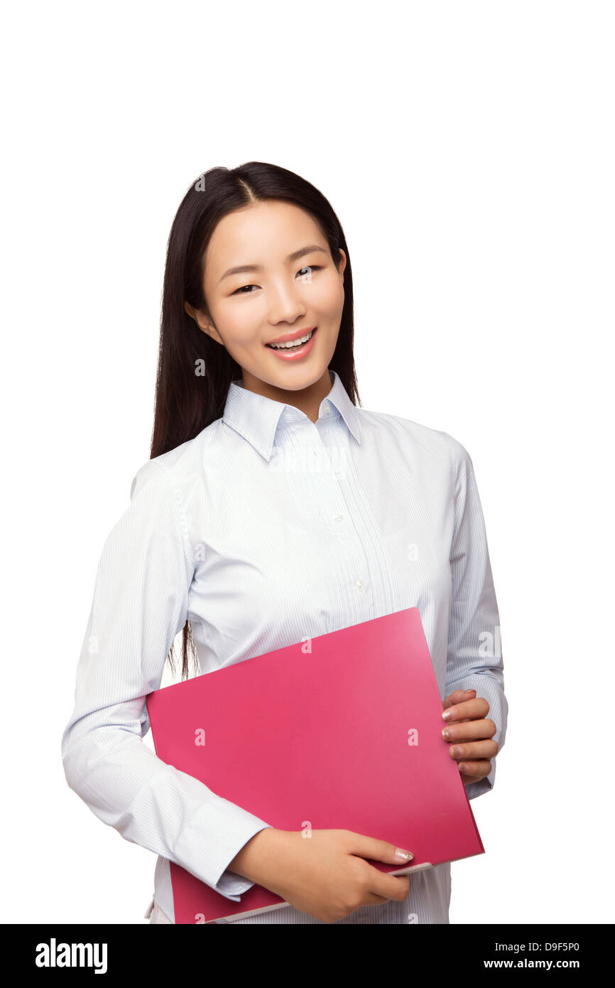 Businesswoman reading documents smiling camera hi-res stock photography and images - Alamy