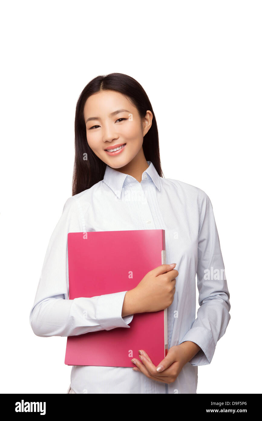 Businesswoman reading documents smiling camera hi-res stock photography ...