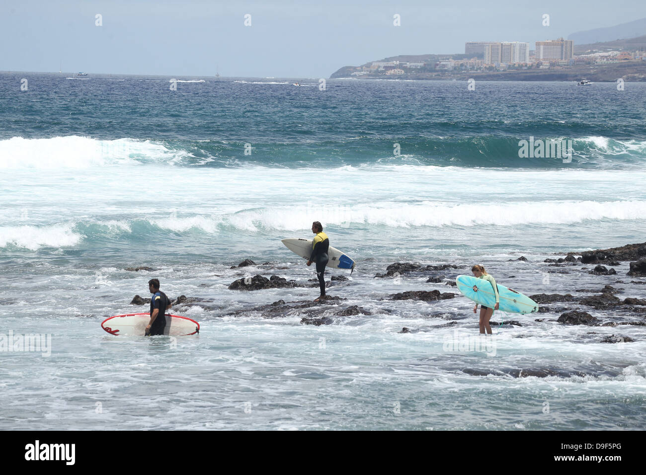 Three surfers hi-res stock photography and images - Alamy