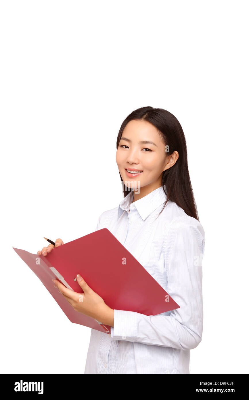 Businesswoman reading documents smiling camera hi-res stock photography ...