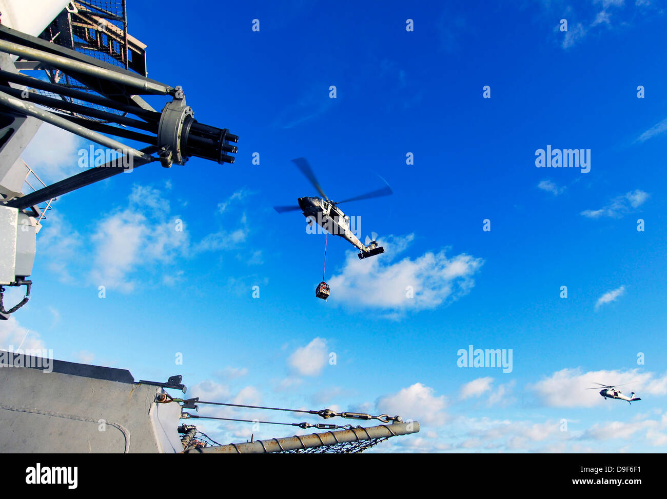 An MH-60S Sea Hawk helicopter transports cargo at sea Stock Photo - Alamy
