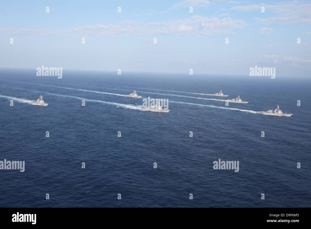 Military ships transit the Philippine Sea in formation Stock Photo - Alamy