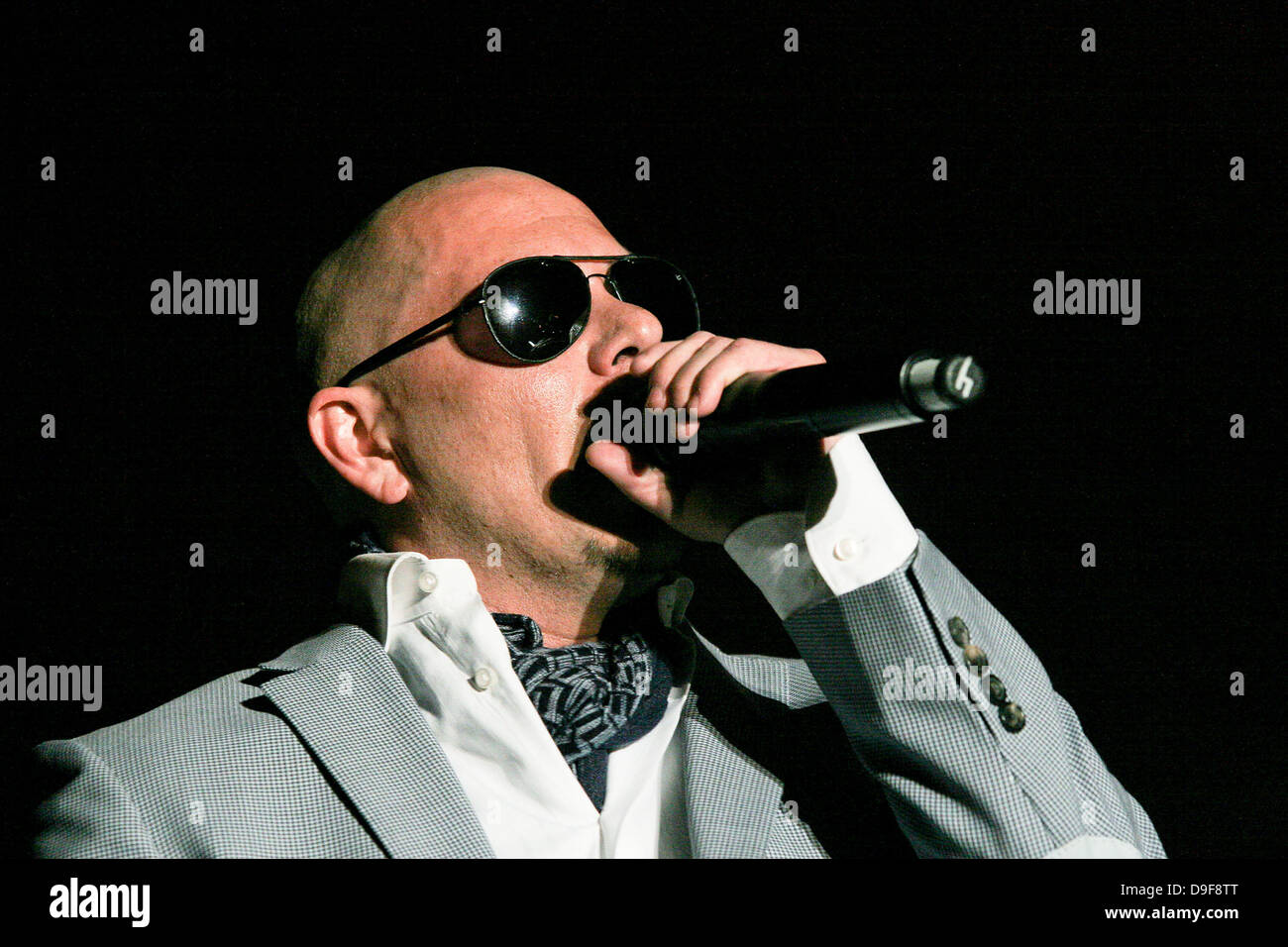 Rapper Pitbull performing on the Music Plaza stage during Mardi Gras at ...