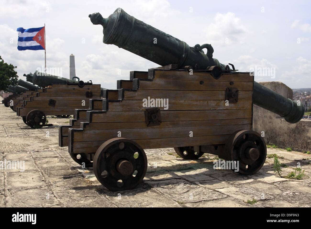 Historic cannons stand on the ramparts of fortress Castillo de los Tres ...