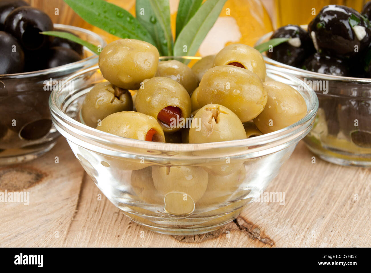 Glass bowls with different olives, Glass bowls of different olive Stock ...
