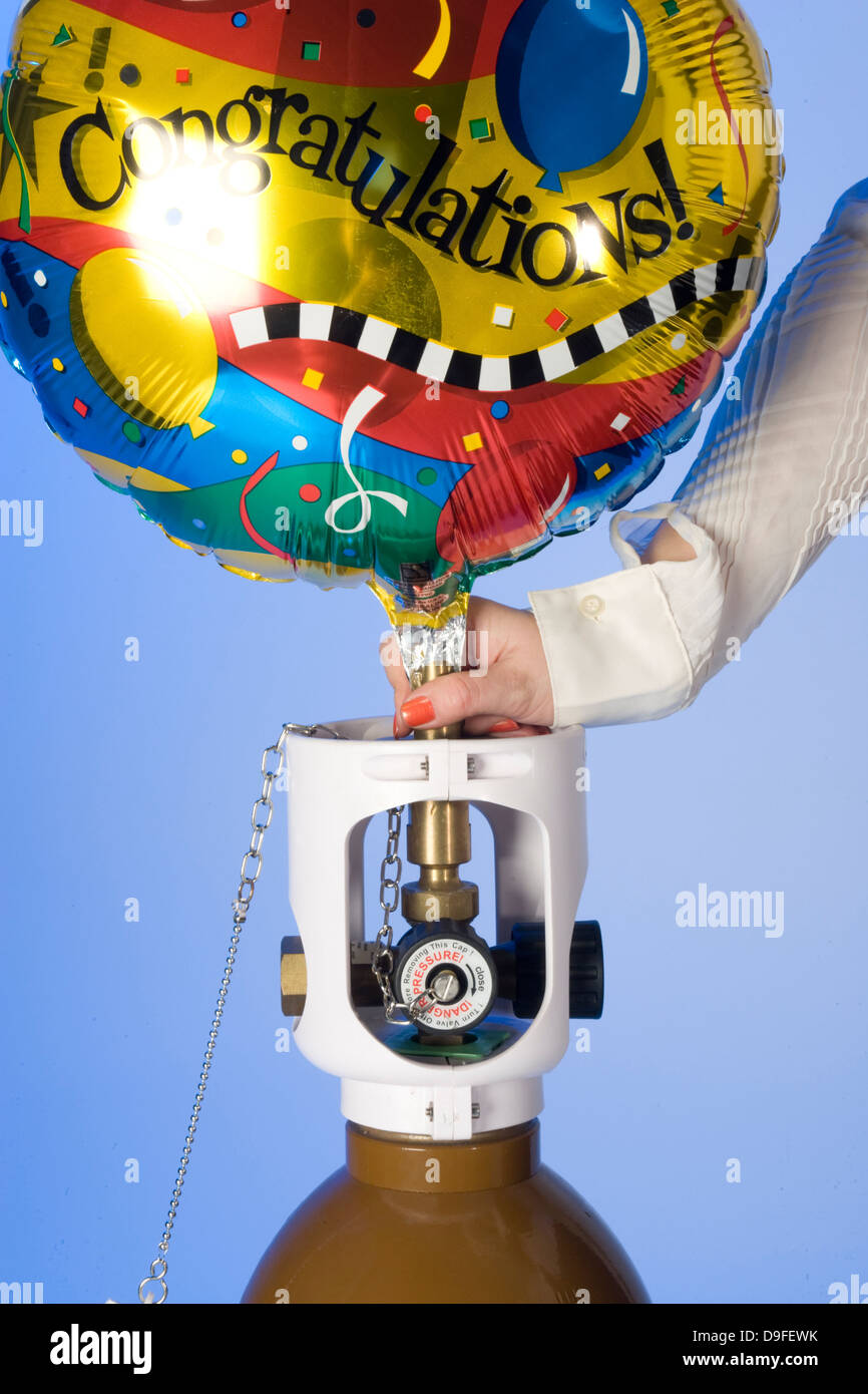 Helium balloons cylinders hi-res stock photography and images - Alamy