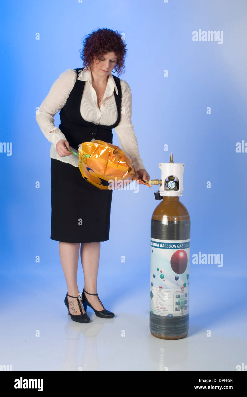 Helium balloons cylinders hi-res stock photography and images - Alamy