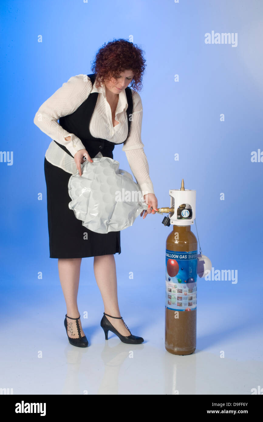 Helium balloons cylinders hi-res stock photography and images - Alamy