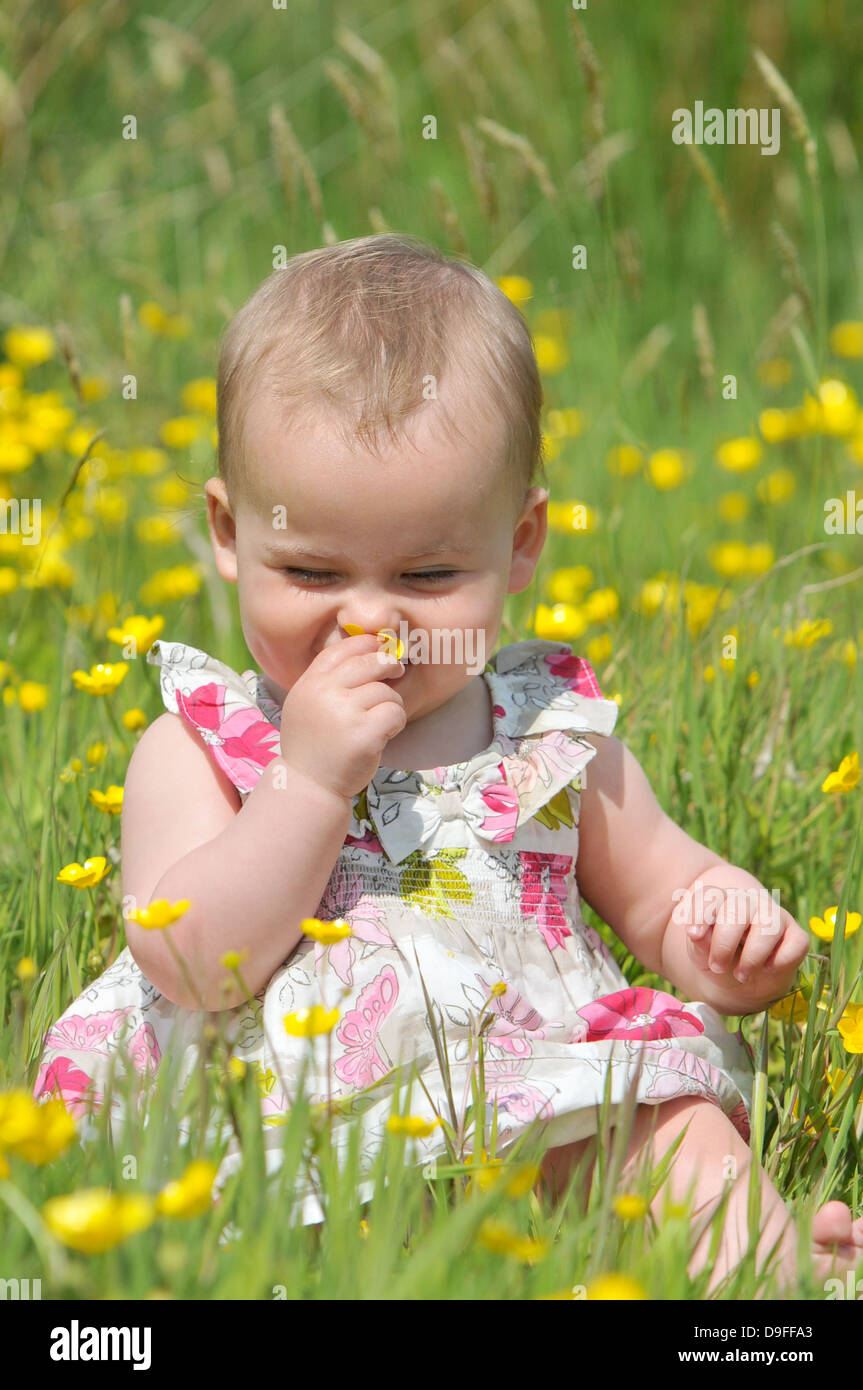 Girl with buttercups hi-res stock photography and images - Alamy