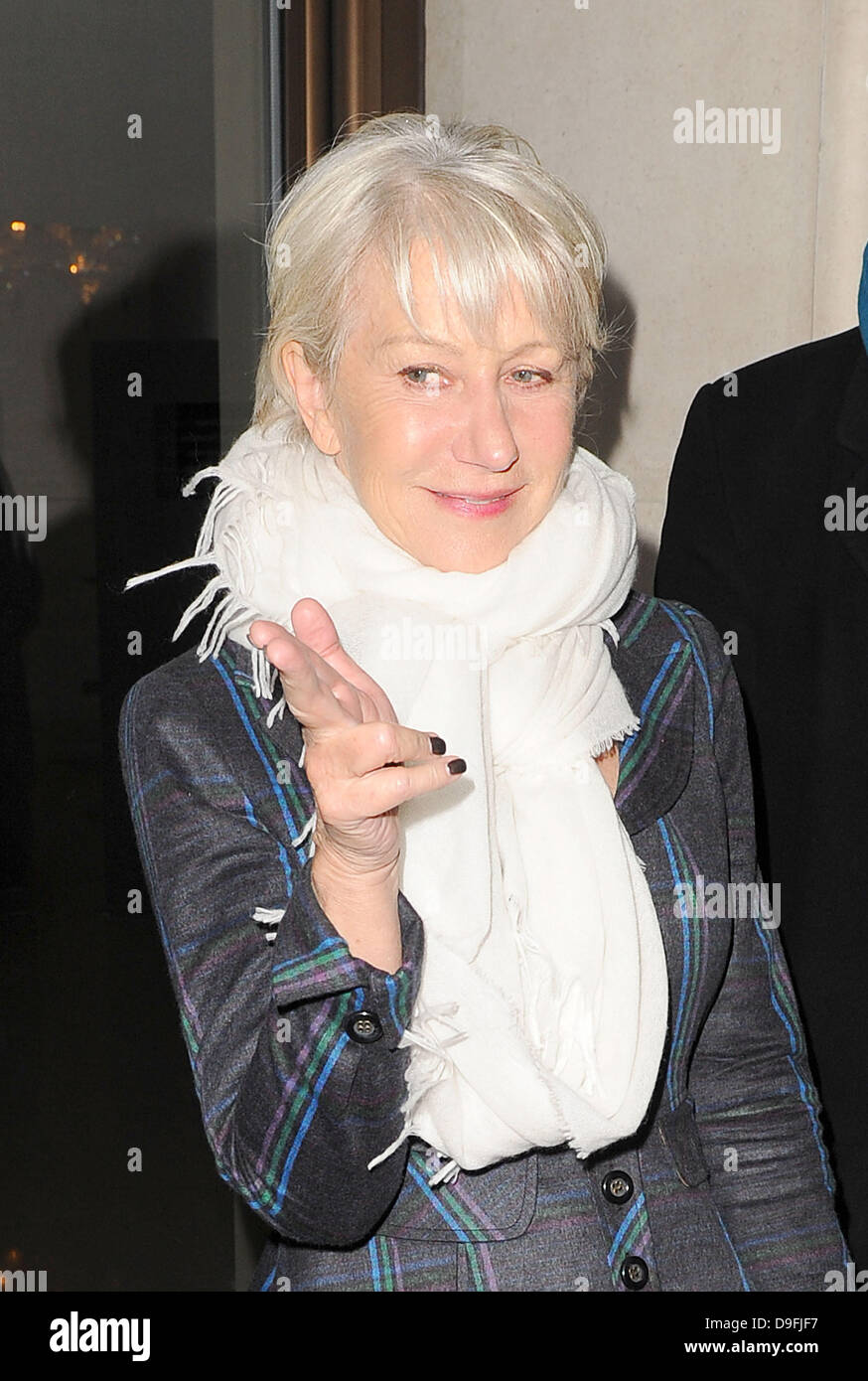 Helen Mirren keeping the chill out wearing an oversized white scarf ...