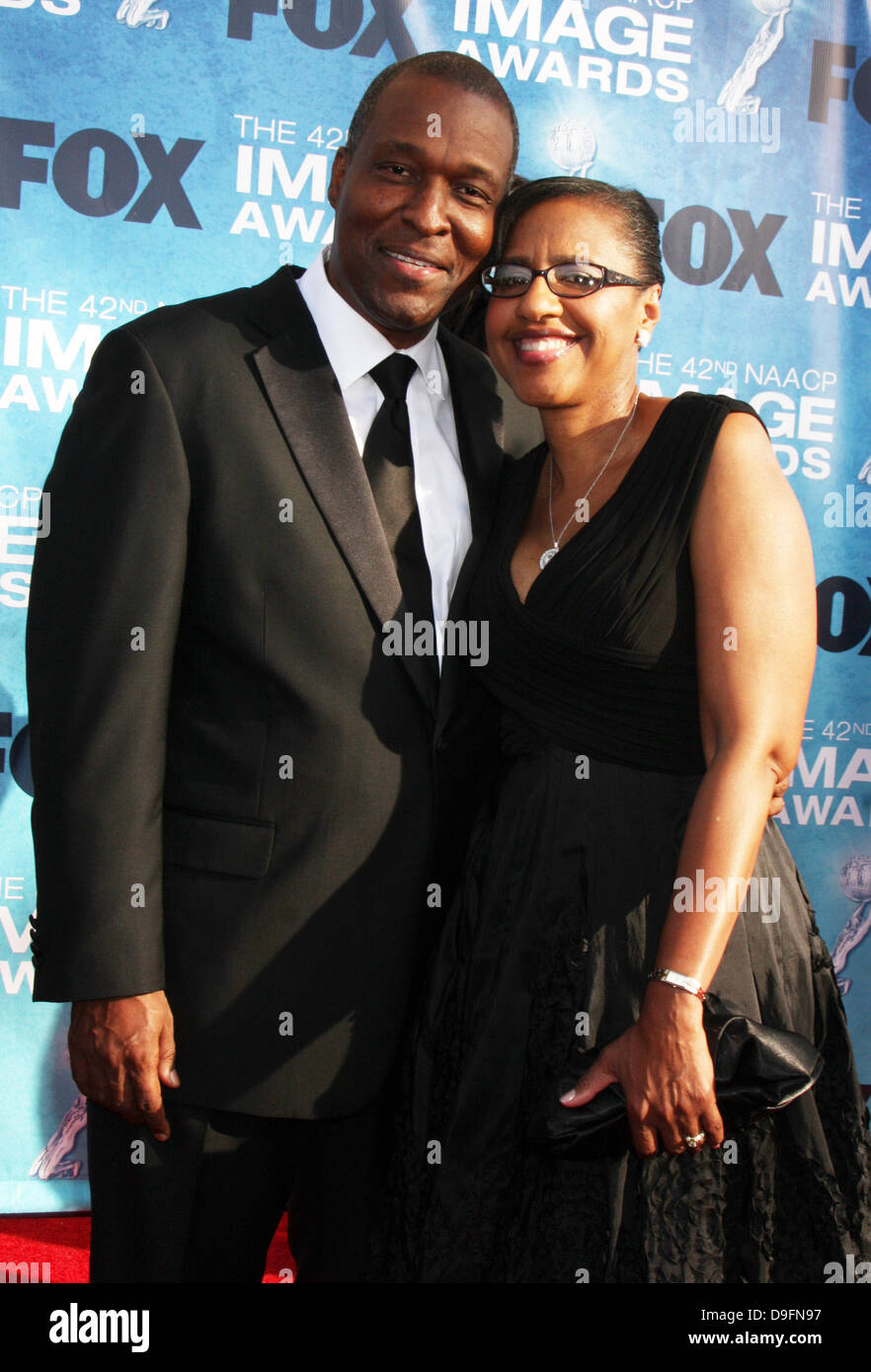 Rodney Saulsberry and Guest 42nd NAACP Image Awards at The Shrine ...