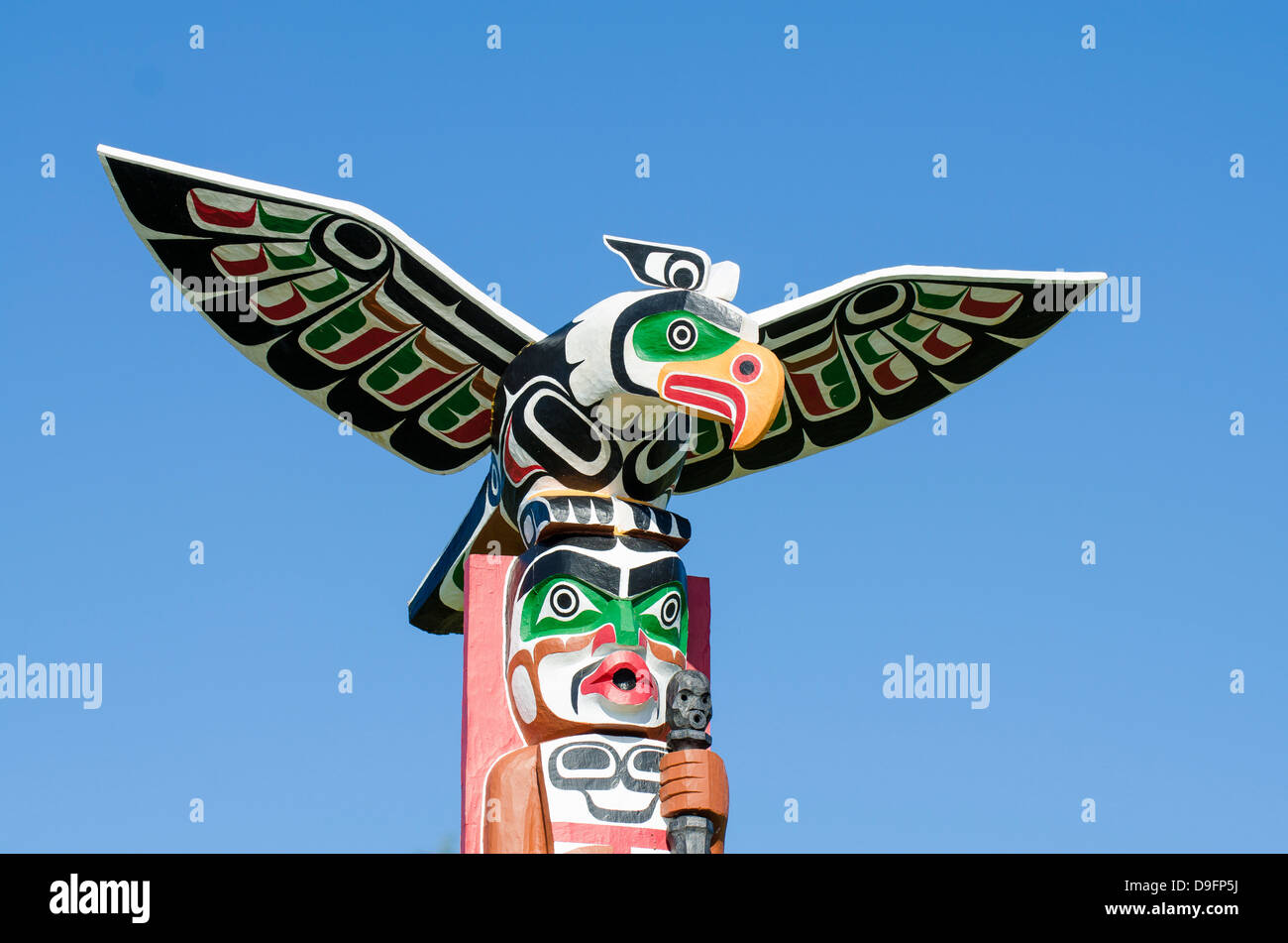 Totem poles in cemetery in Alert Bay, British Columbia, Canada Stock ...