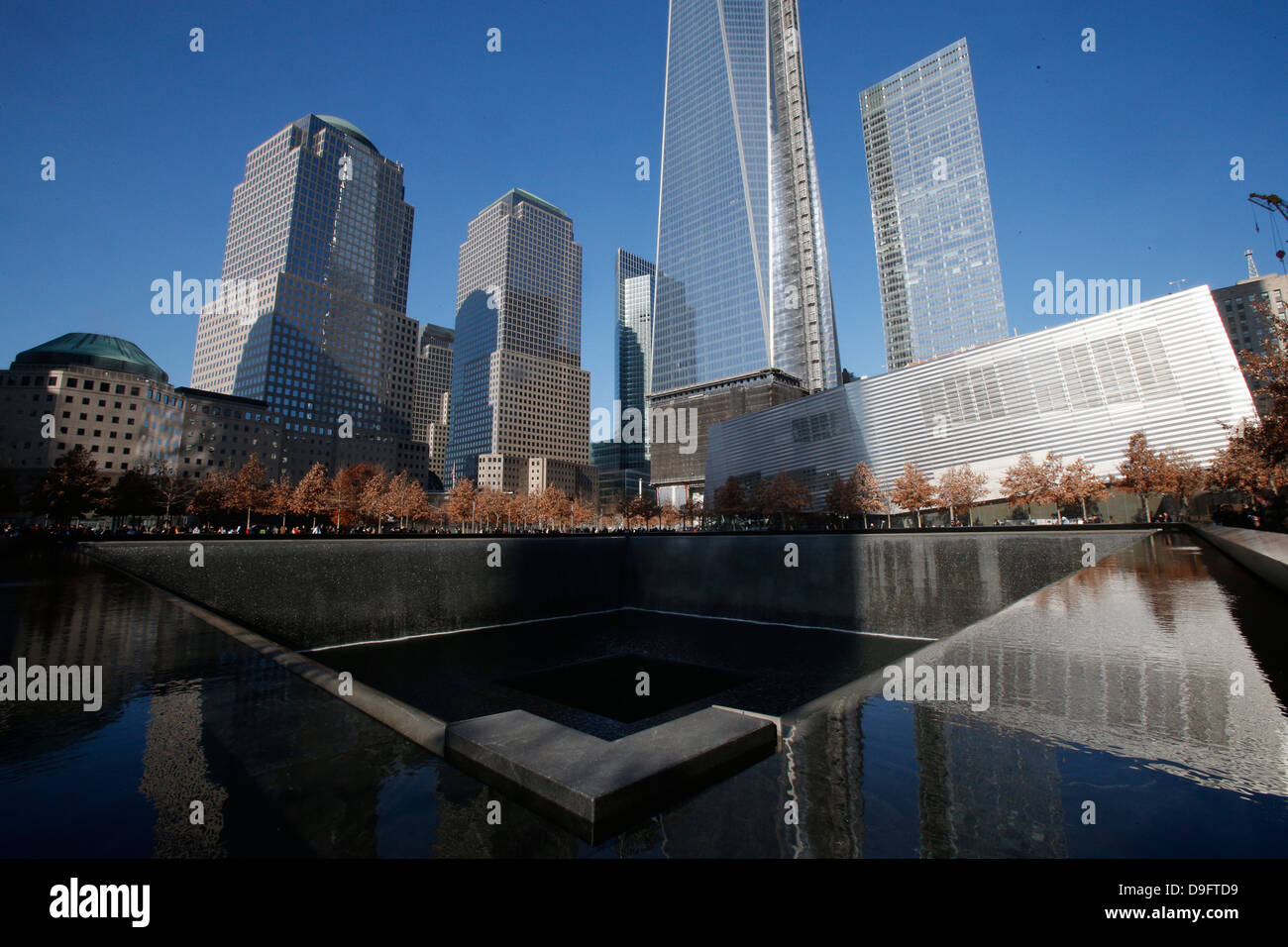 Ground Zero, the National 9/11 Memorial at the site of the World Trade ...