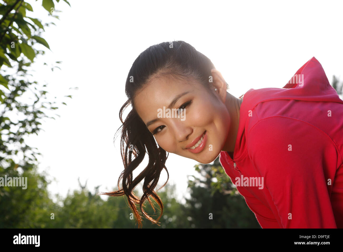 Young woman under the sunshine Stock Photo - Alamy
