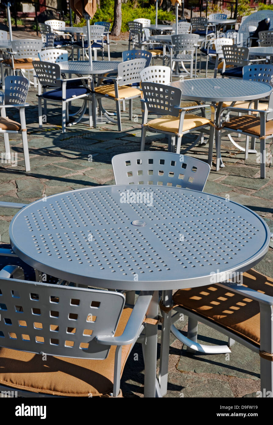 Empty table and chairs at an outside outdoor restaurant bar pub cafe ...