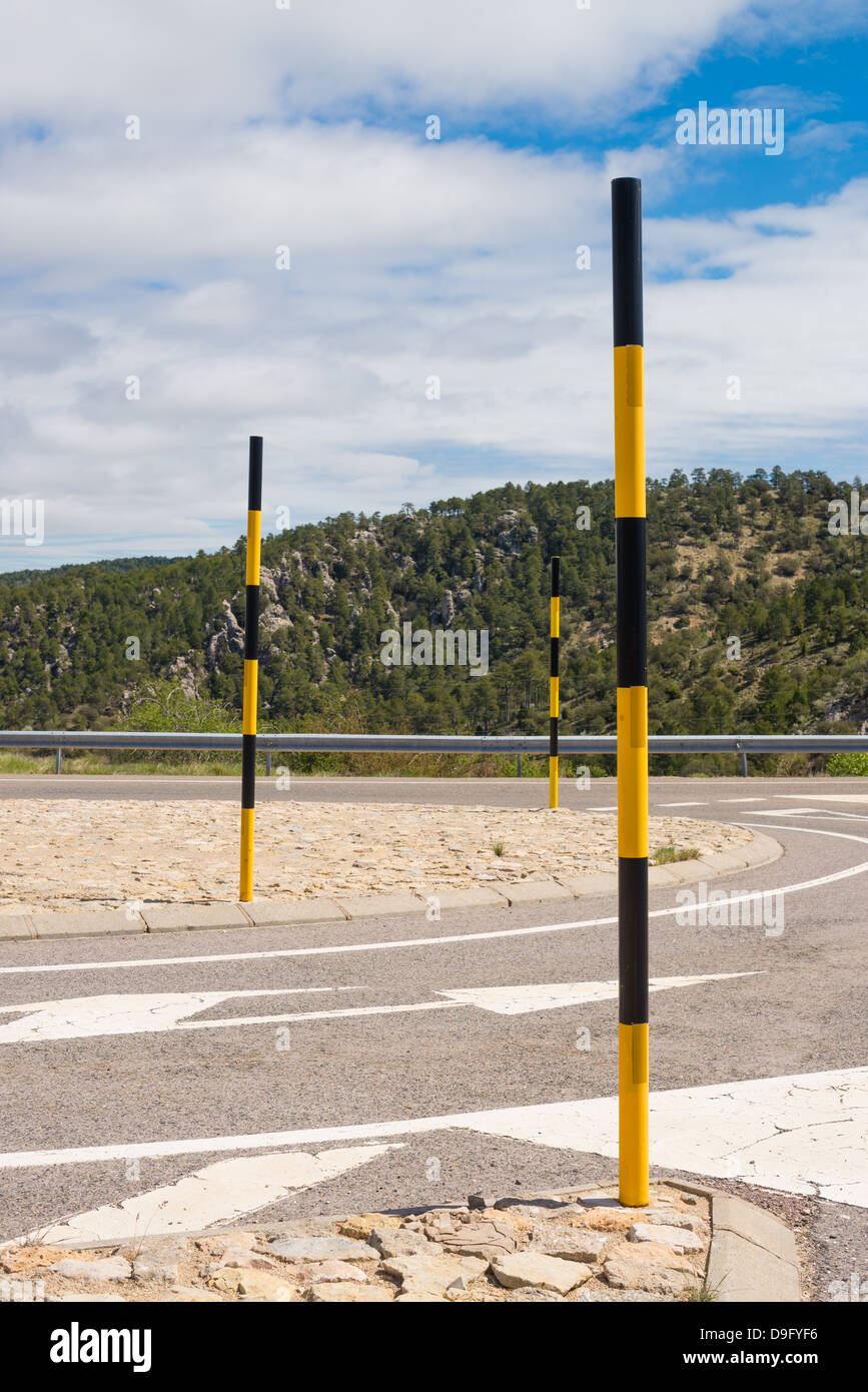 Snow poles on a mountain road ready for winter Stock Photo - Alamy