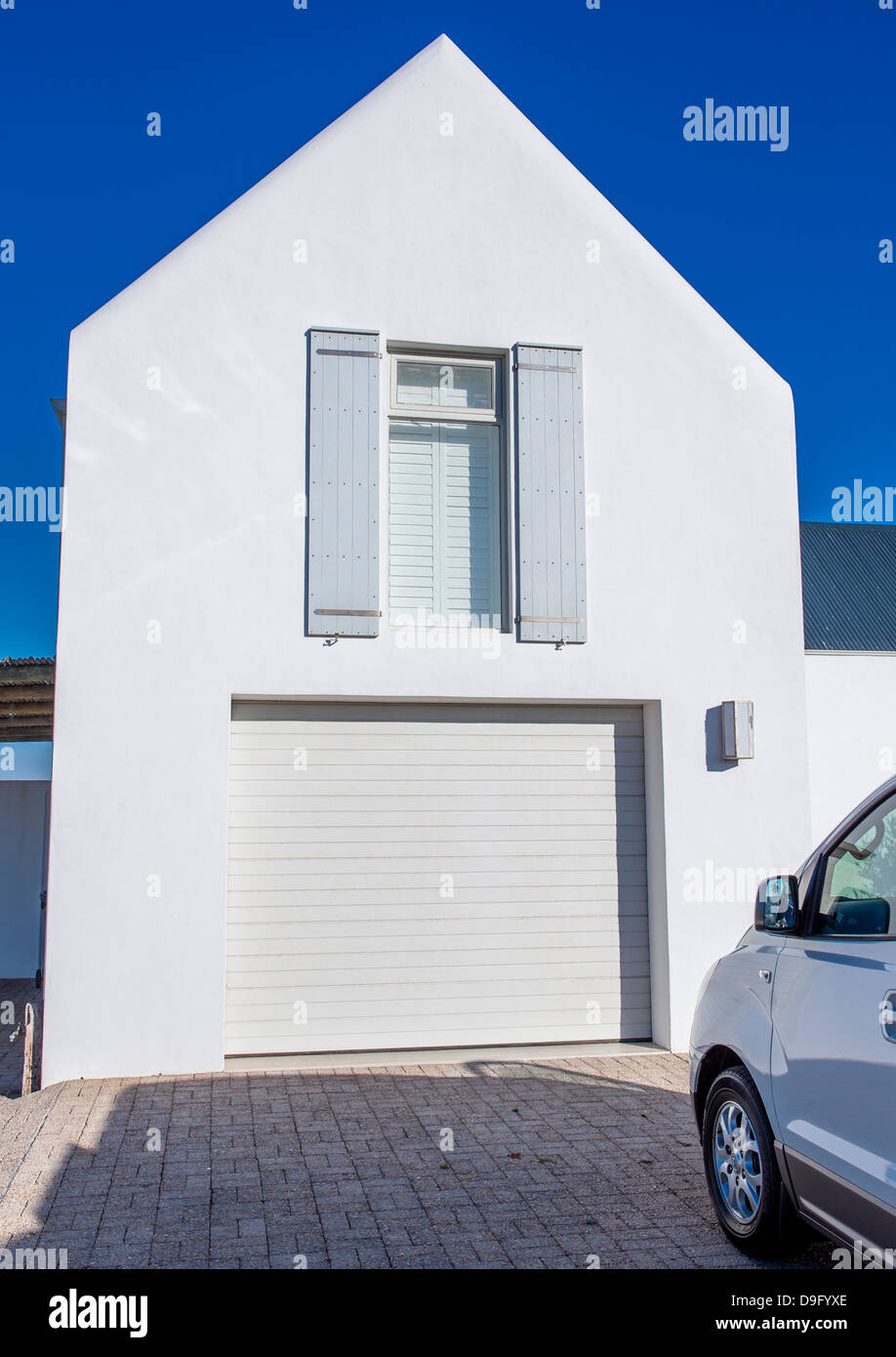 Car parked outside a building Stock Photo - Alamy