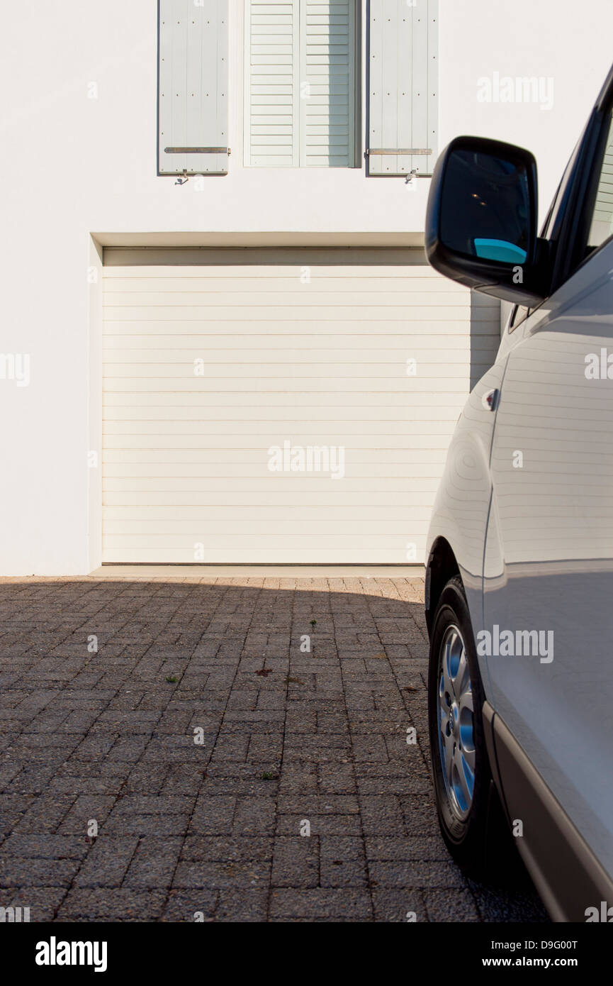 Car parked outside a building Stock Photo - Alamy