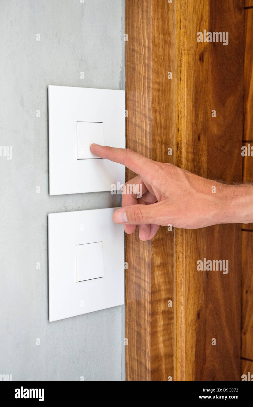 Turning on a light switch hi-res stock photography and images - Alamy