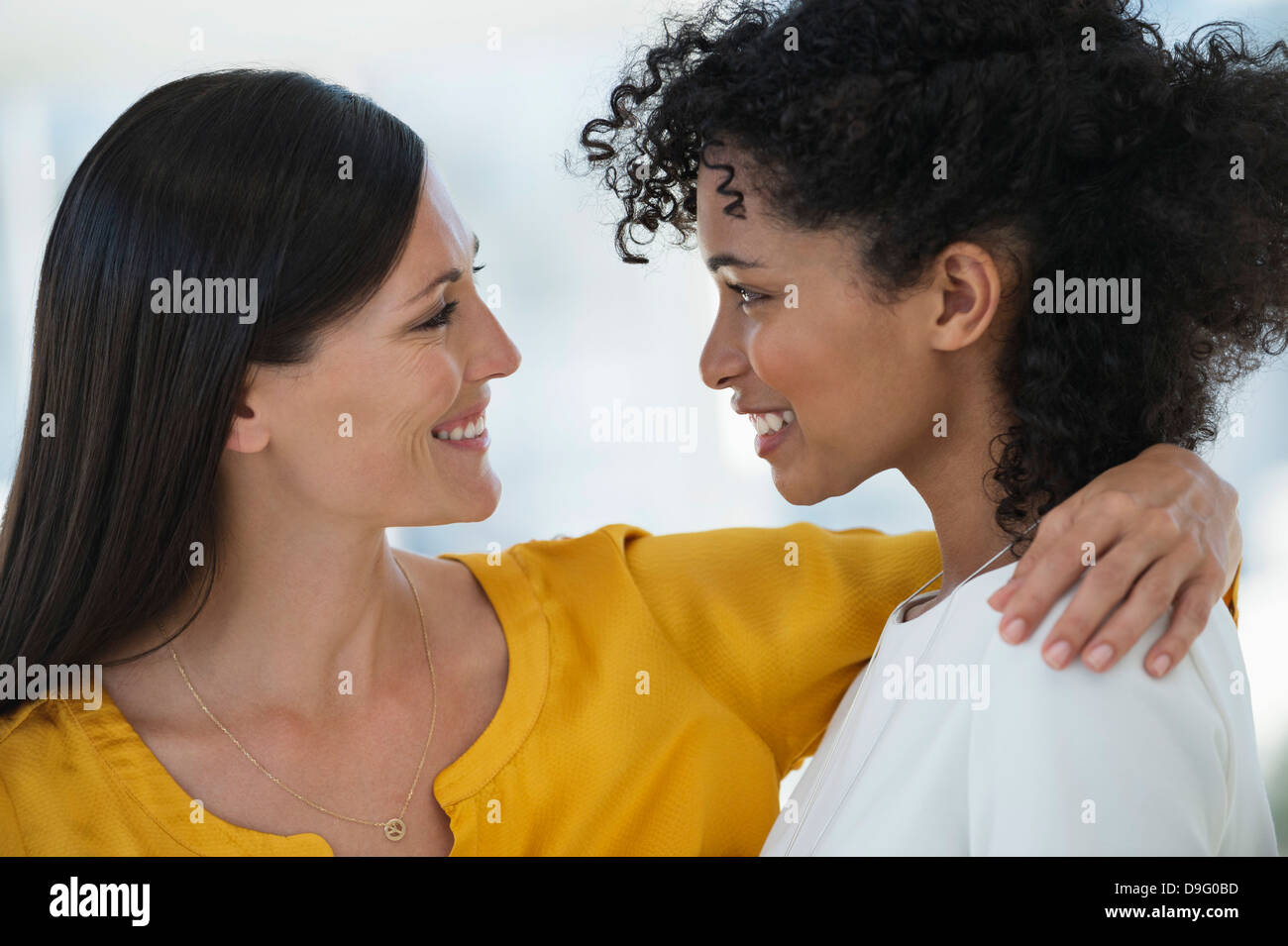 Female friends smiling hi-res stock photography and images - Alamy