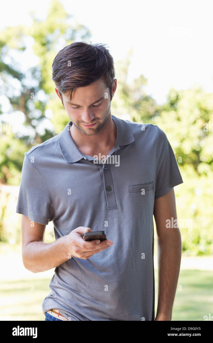 Man using a mobile phone Stock Photo - Alamy
