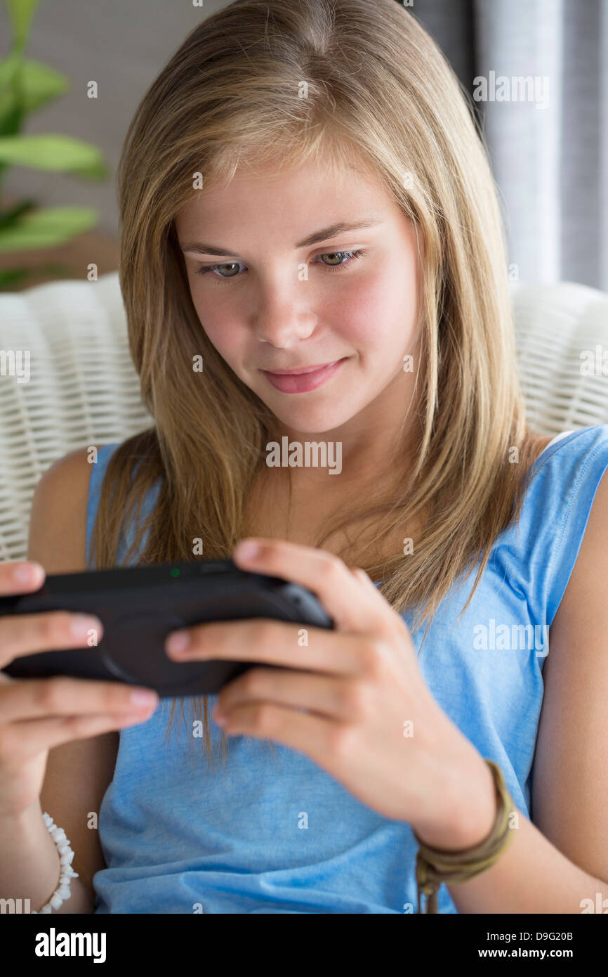 Close-up of a girl playing video game Stock Photo - Alamy