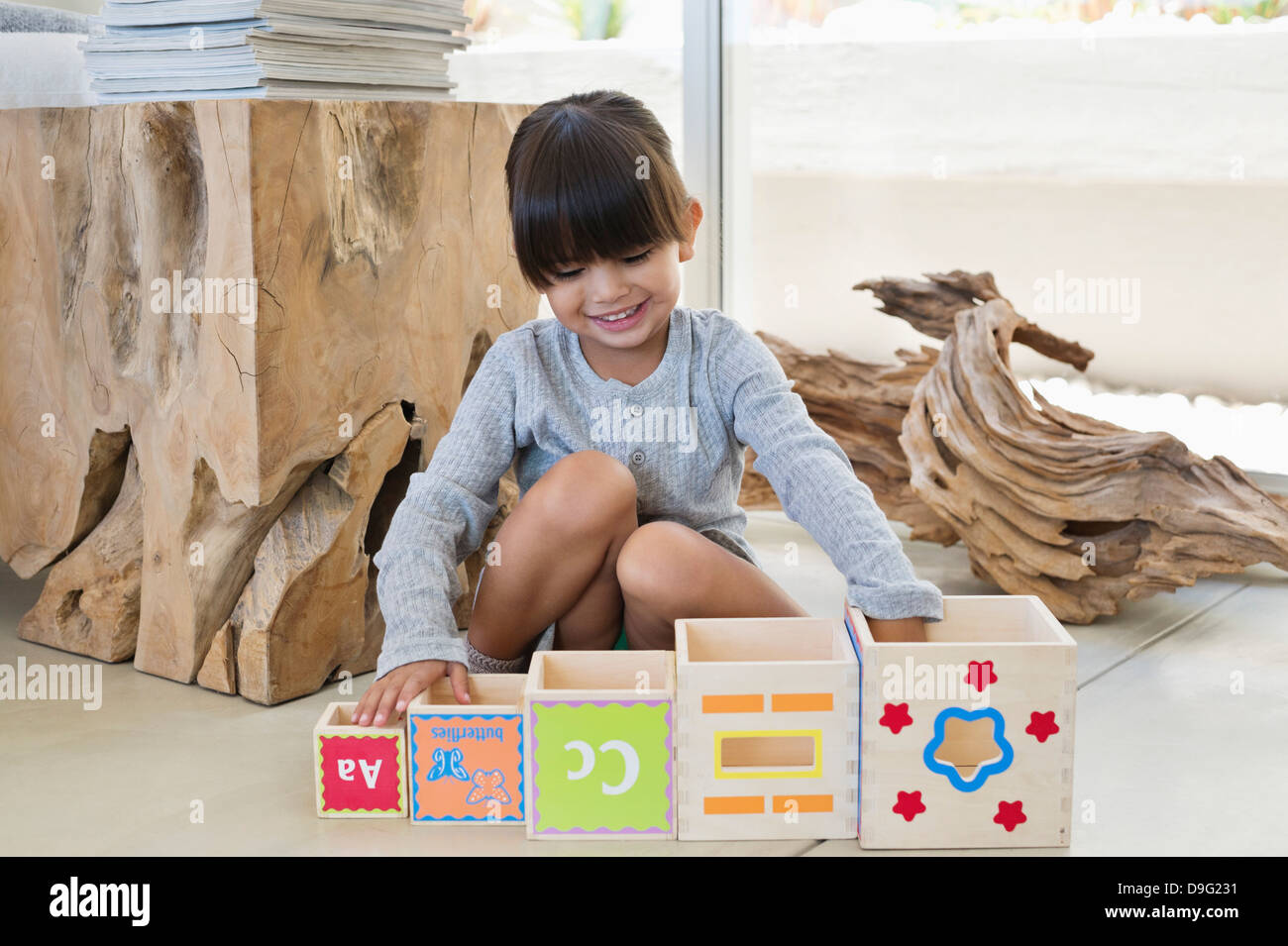 Girl holding number blocks hi-res stock photography and images - Alamy