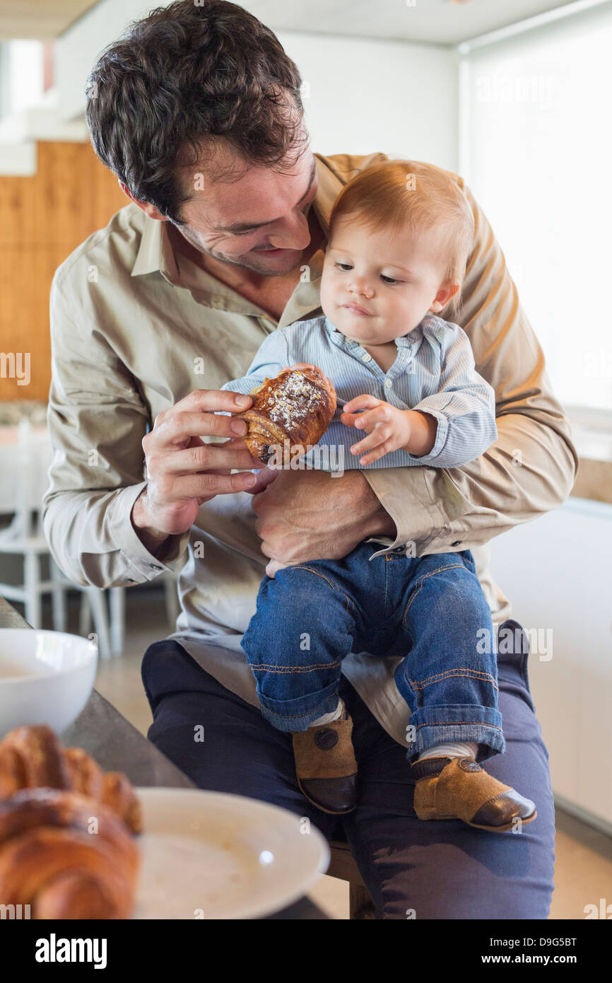 Father feeding breakfast son hi-res stock photography and images - Alamy