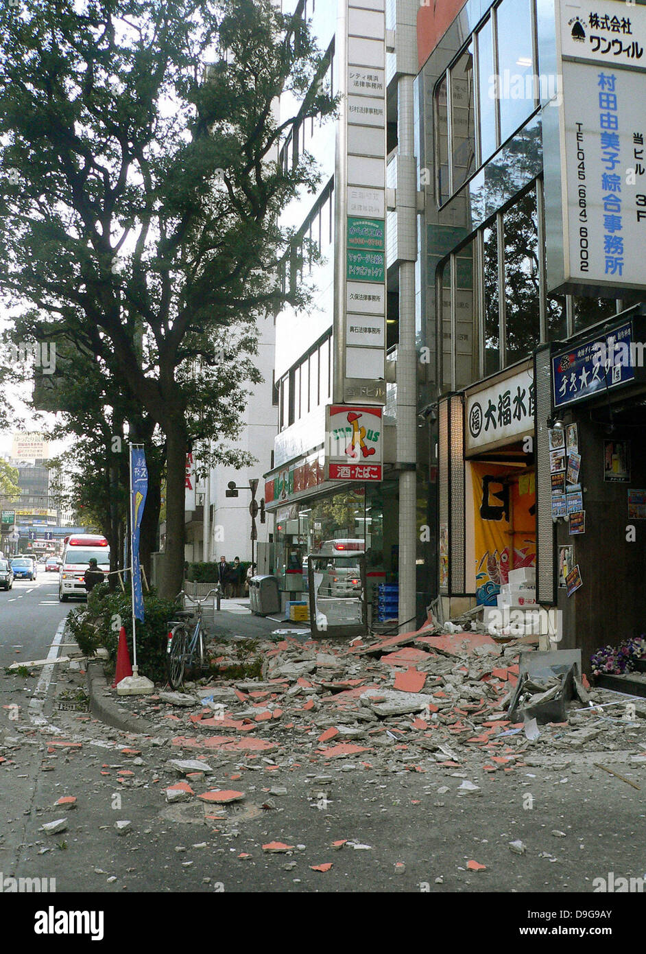 Debris fall from buildings in Yokohama, Kanagawa Prefecture,, after a ...