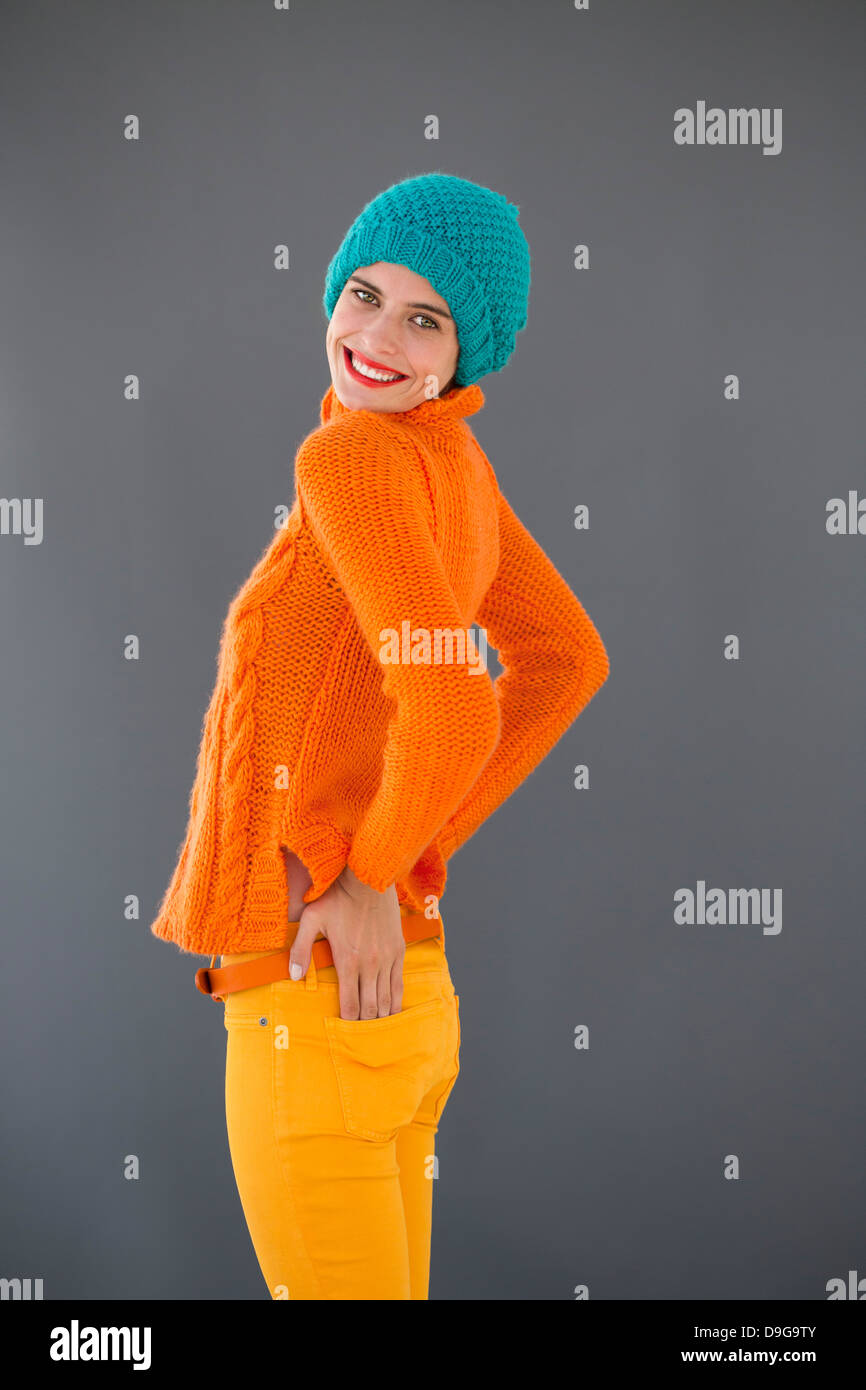 Portrait of a smiling woman posing Stock Photo - Alamy