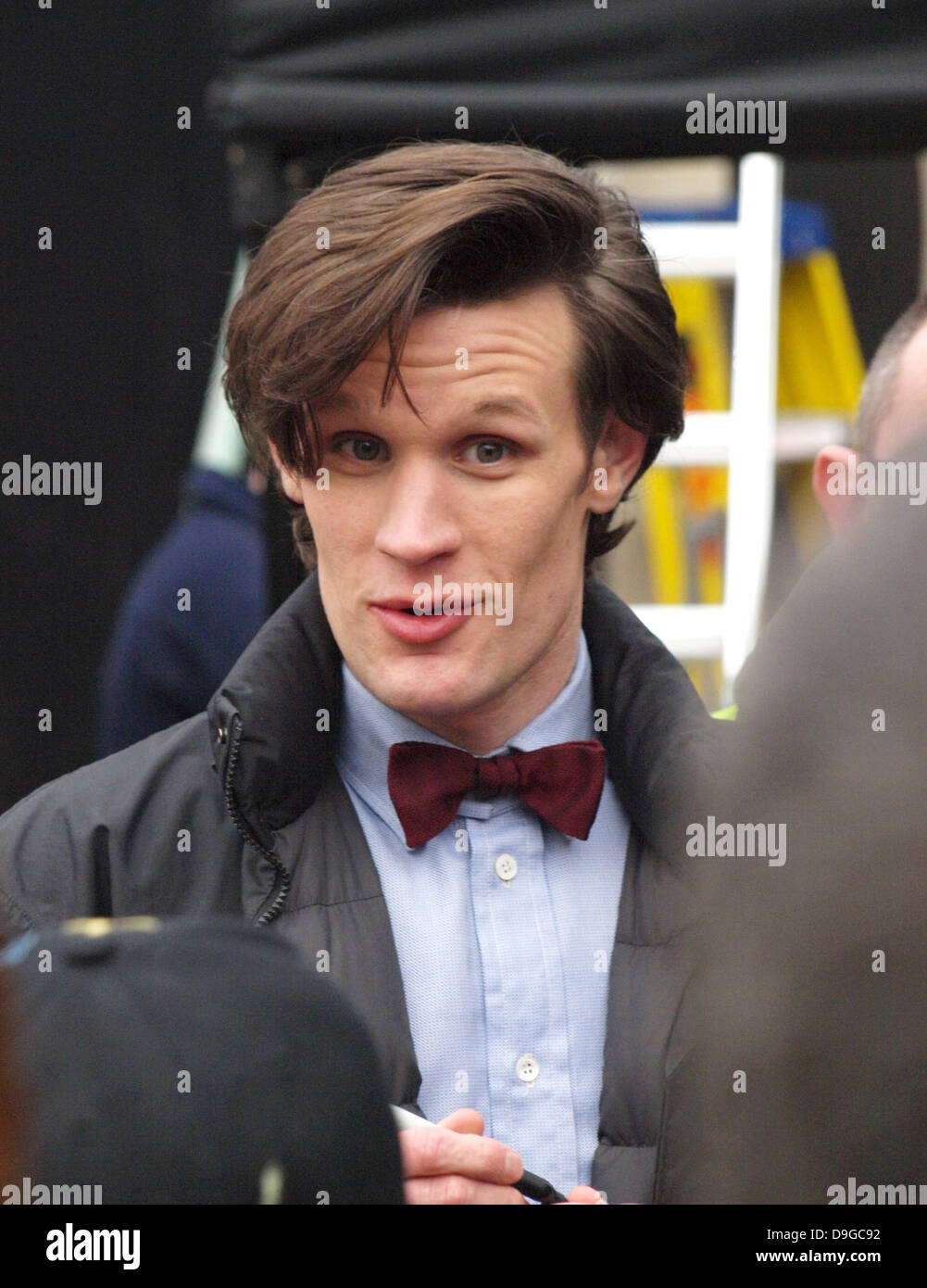 Matt Smith signs autographs for fans as he takes a break from filming ...