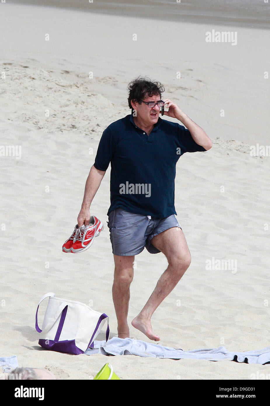 American billionaire Peter Brant and his family spend time on the beach ...
