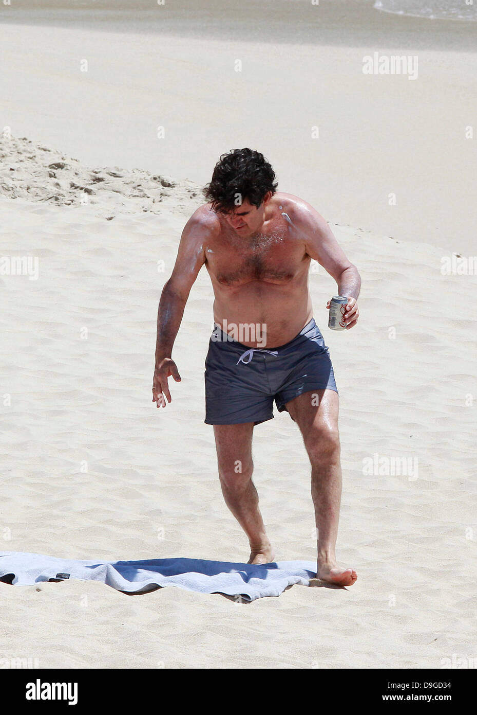 American billionaire Peter Brant and his family spend time on the beach ...