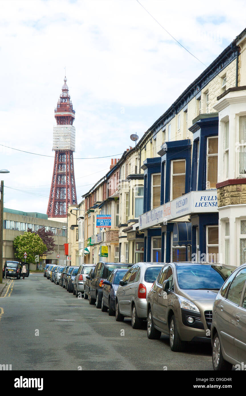 Cars parked outside small hotels in Blackpool Stock Photo - Alamy