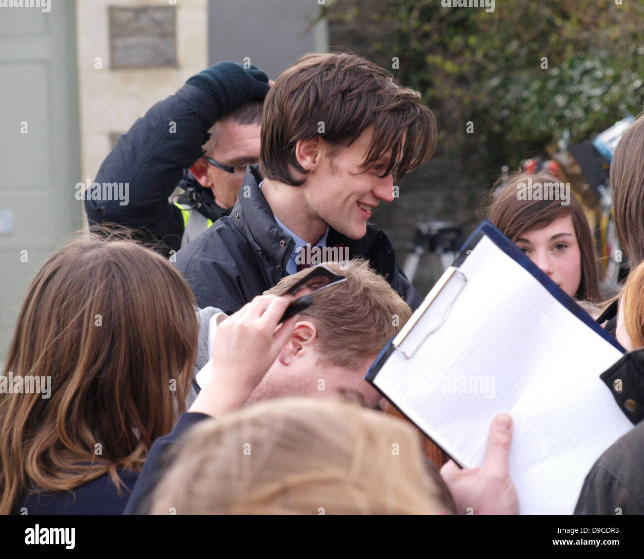 Matt Smith signs autographs while taking a break from filming the BBC ...