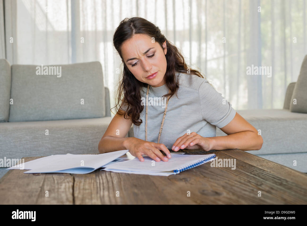 Woman doing paperwork hi-res stock photography and images - Alamy