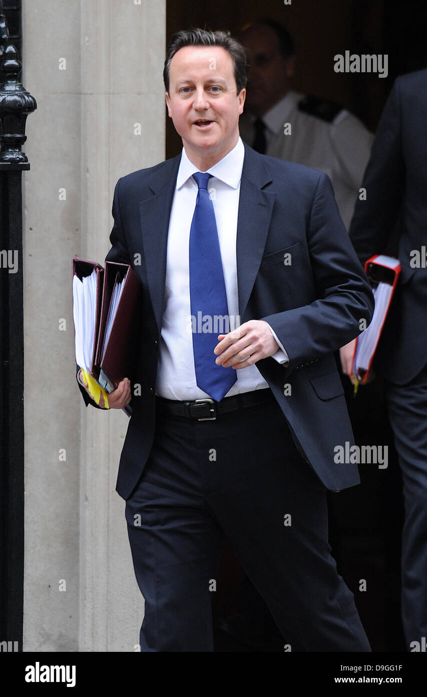 Prime Minister David Cameron leaves 10 Downing Street on his way to ...