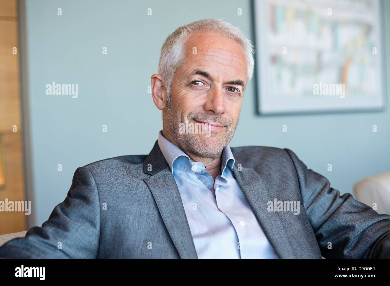Portrait of a businessman smiling Stock Photo - Alamy