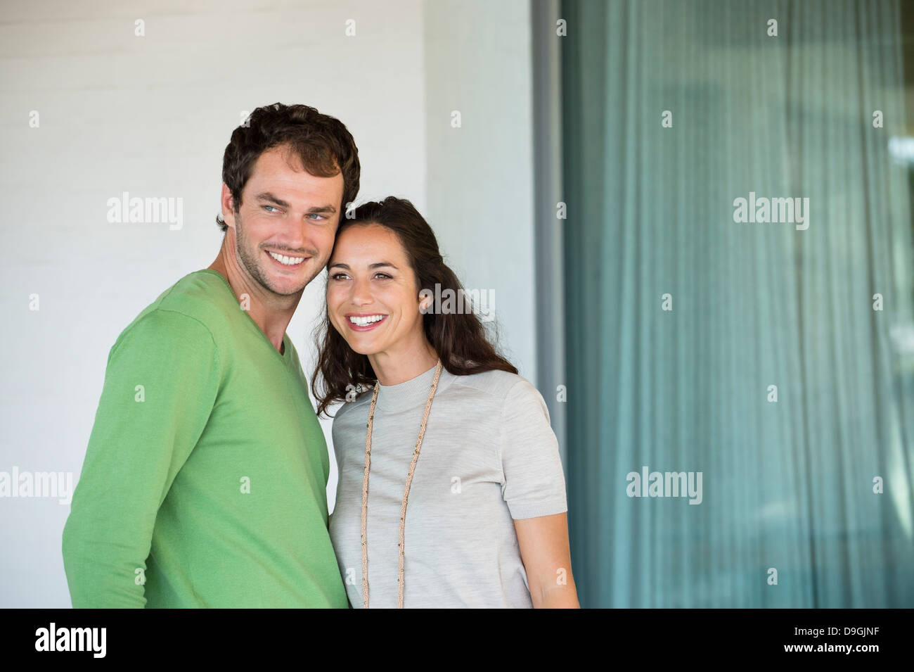 Couple smiling together Stock Photo - Alamy