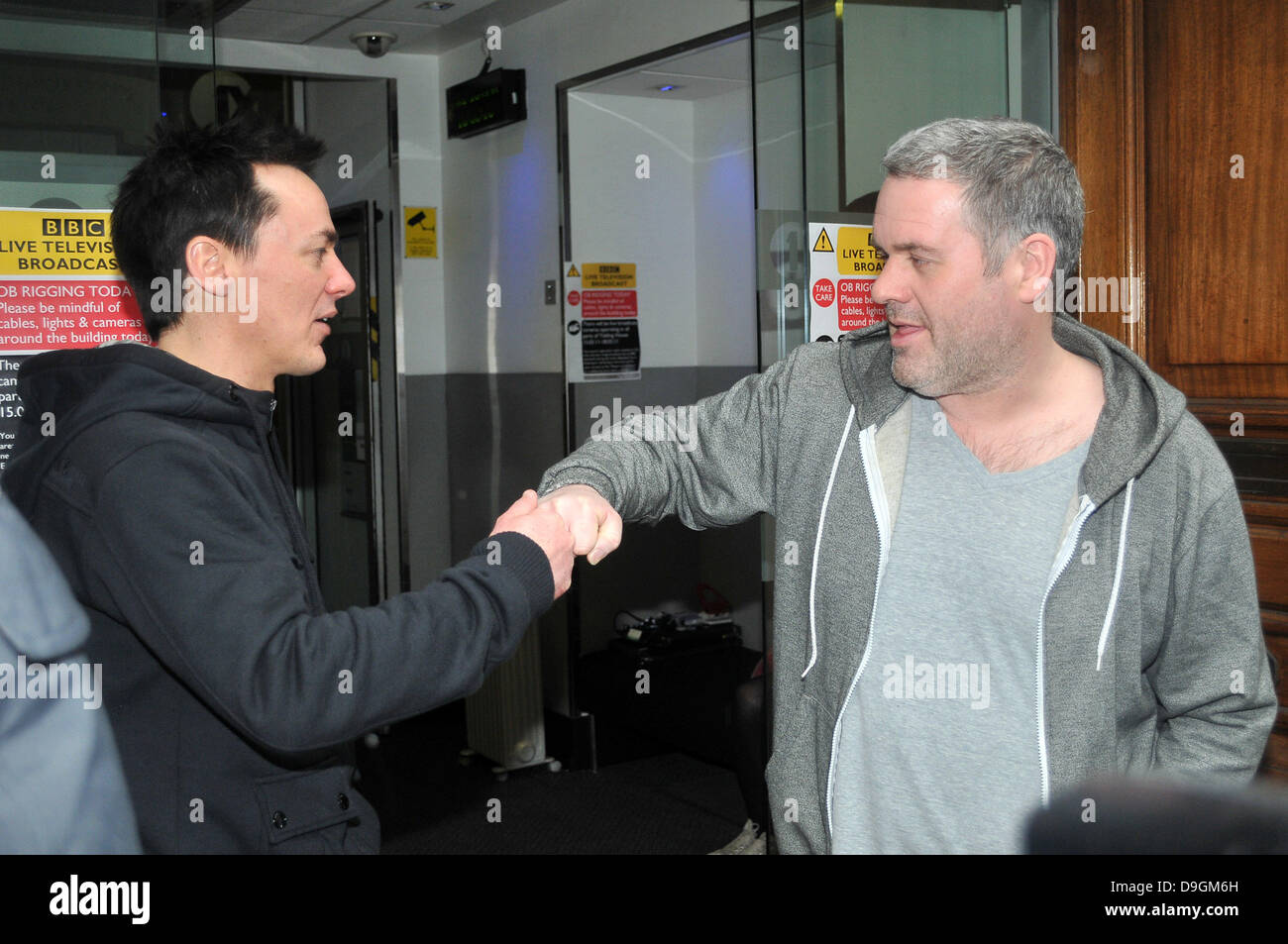Dave Vitty, aka Comedy Dave, and Chris Moyles congratulate each other ...