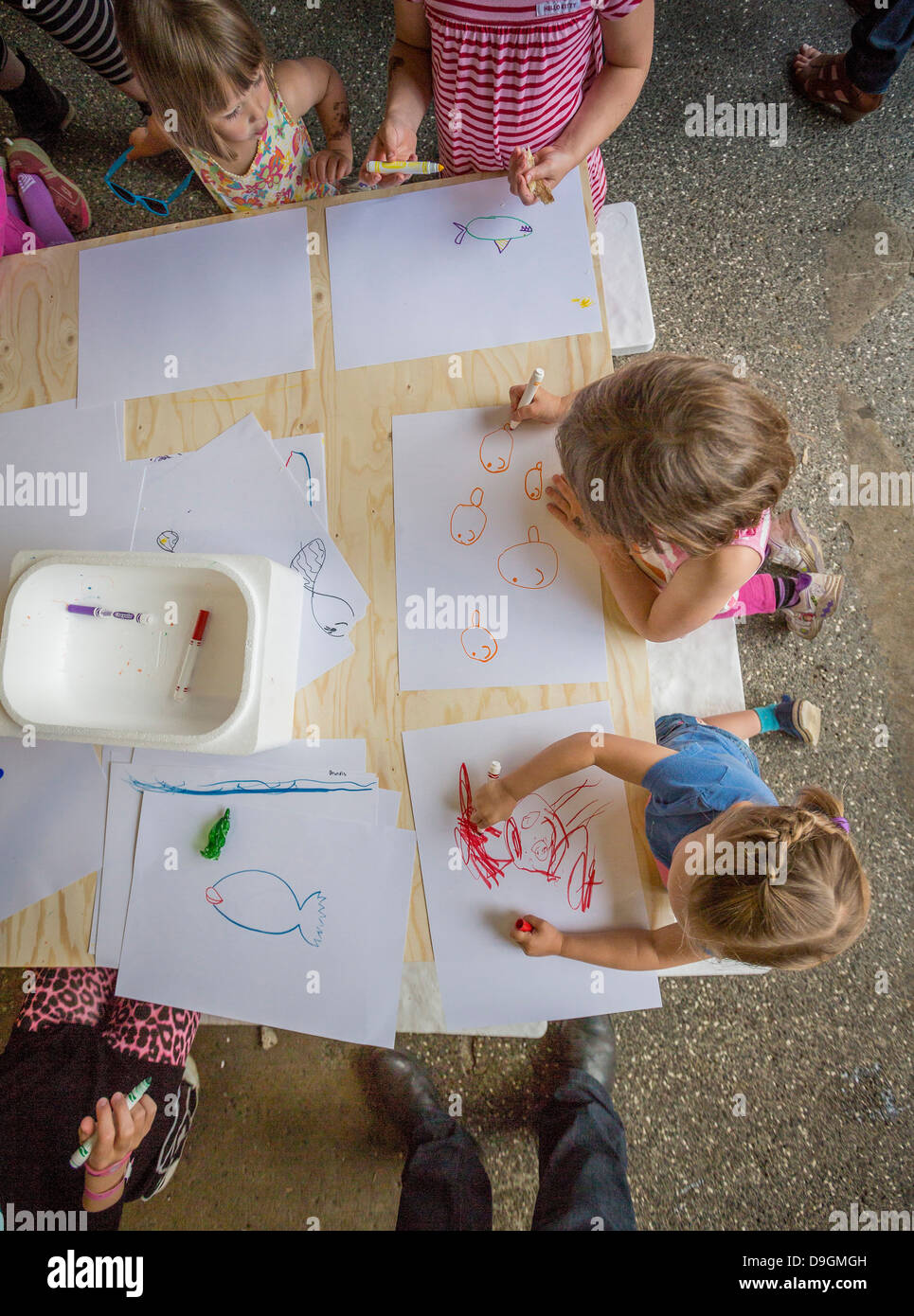 Overhead view of children drawing, Dalvik, Iceland Stock Photo - Alamy