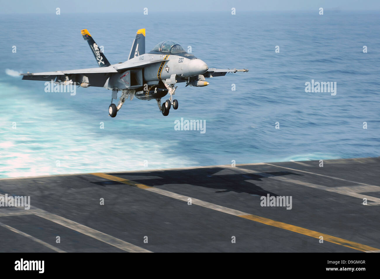 An F/A-18F Super Hornet prepares to land on the flight deck USS Dwight ...