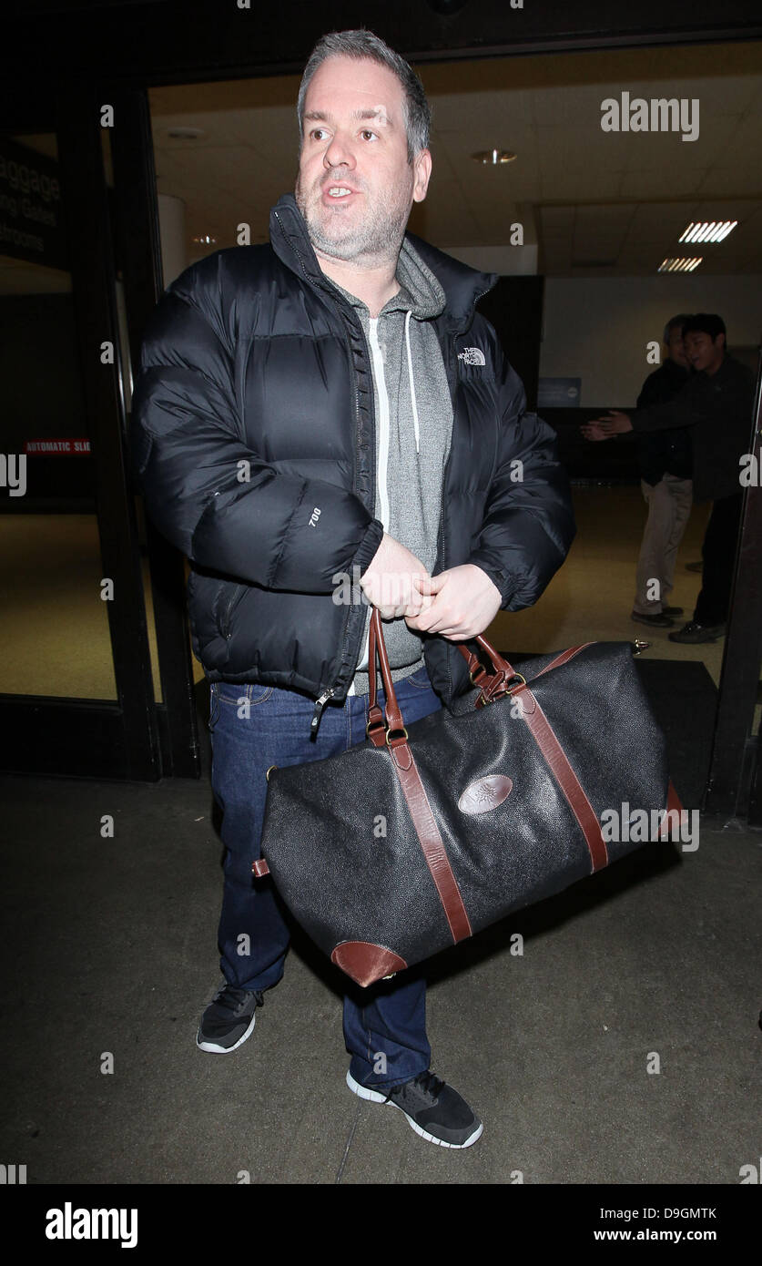 Chris Moyles arrives at LAX airport on an international flight from ...