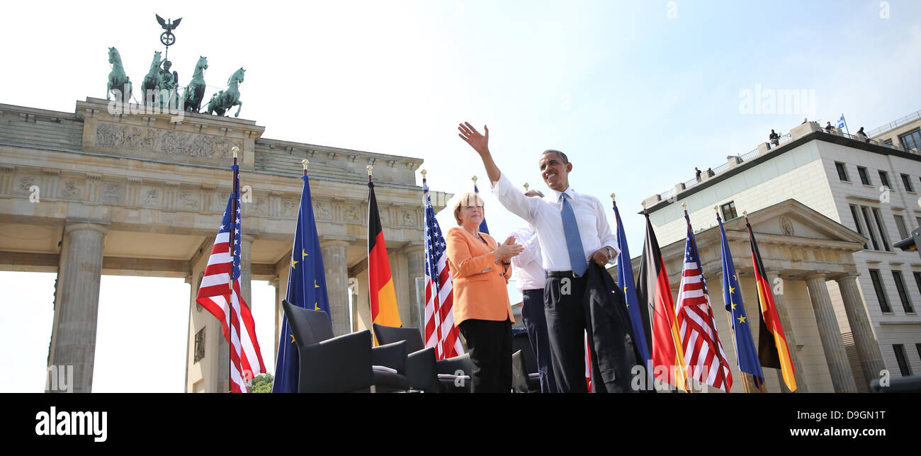 Berlin, Germany. 19th June, 2013. US President Barack Obama (r) waves ...