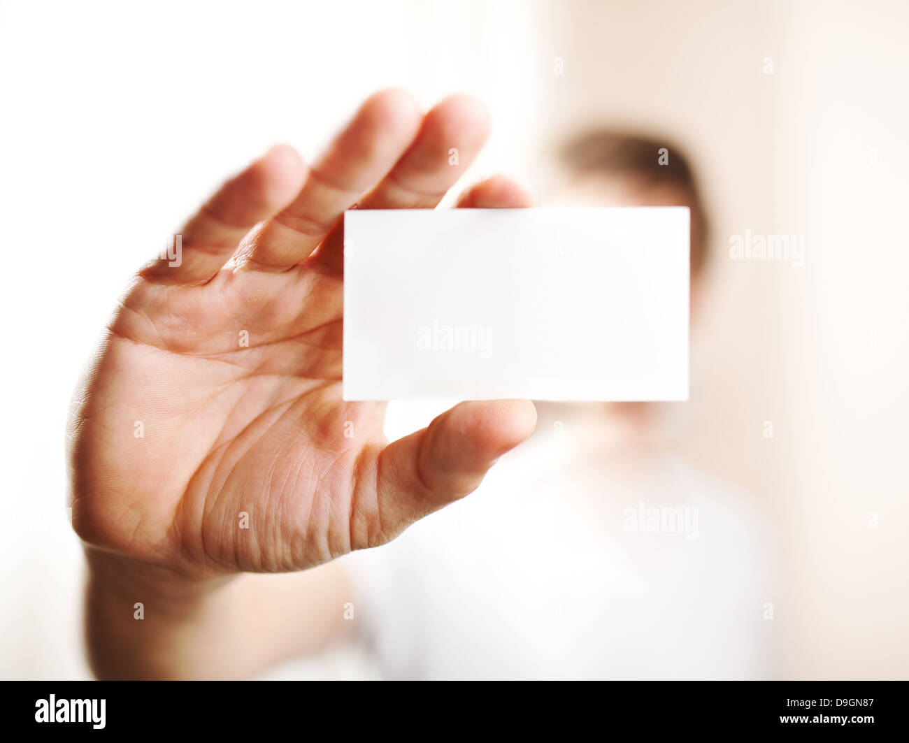 Hand holding small card hi-res stock photography and images - Alamy