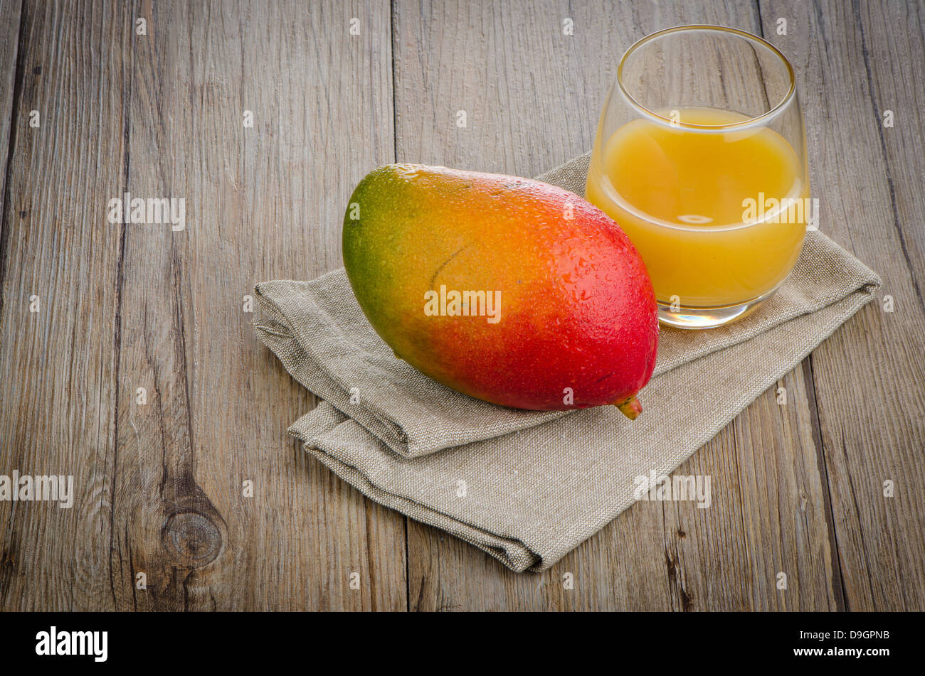 Fresh mango juice and mango fruit Stock Photo - Alamy